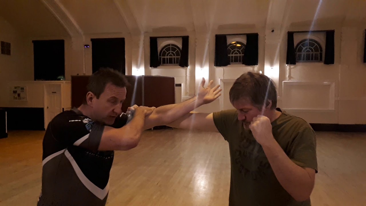 Defence against jab cross into arm trap technique - Essex Fighting Arts ...