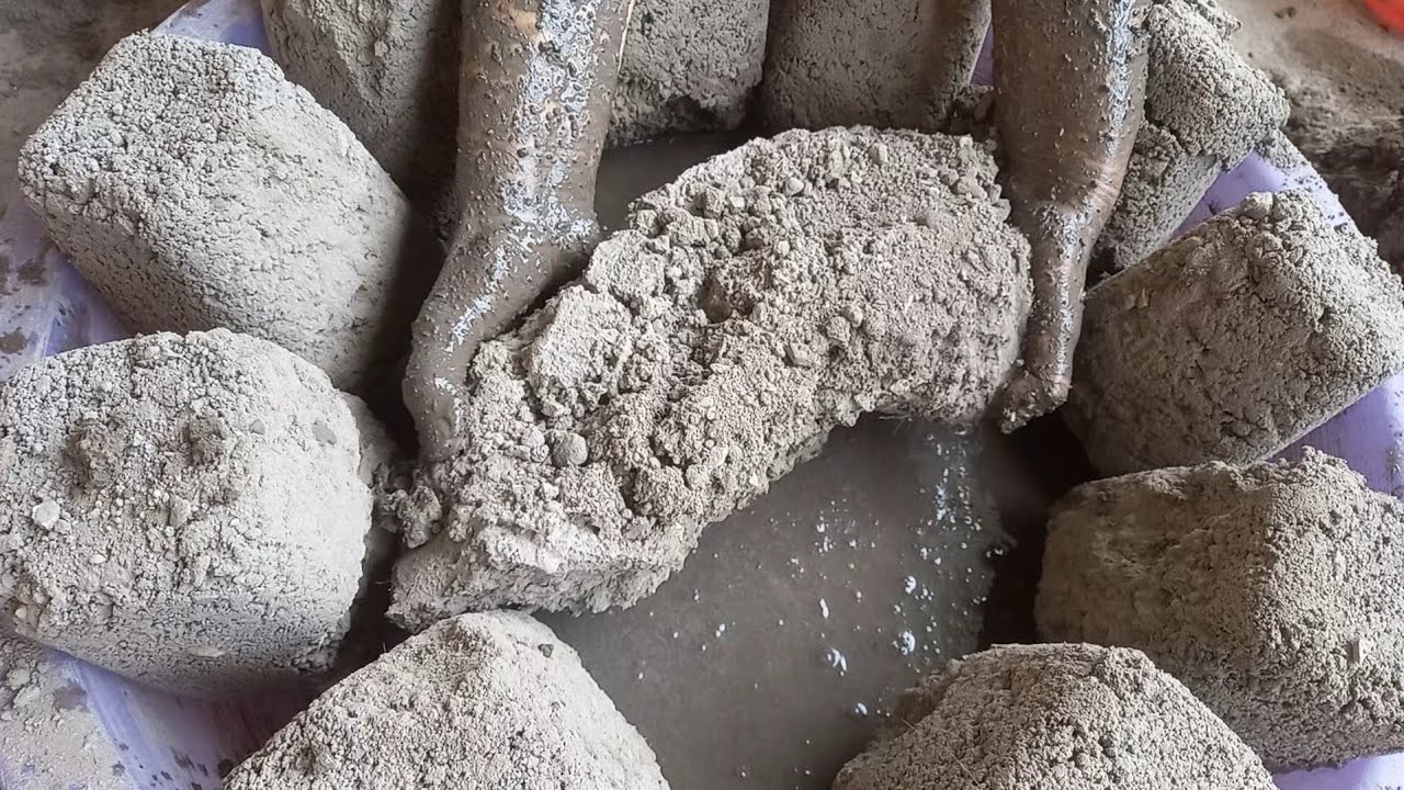 dusty charcoal cement concrete chunks shapes crumbling in water | super ...