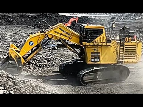 Transporting The 100 Tones Dumper loading OB Transport Dump komastu 3000pc Excavator By Side ...