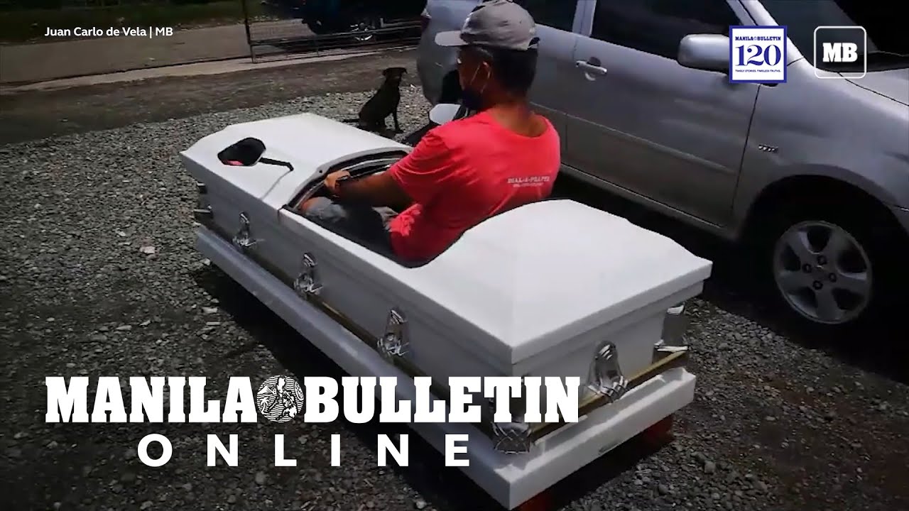 An electric bike converted into a casket rides in Cebu - YouTube