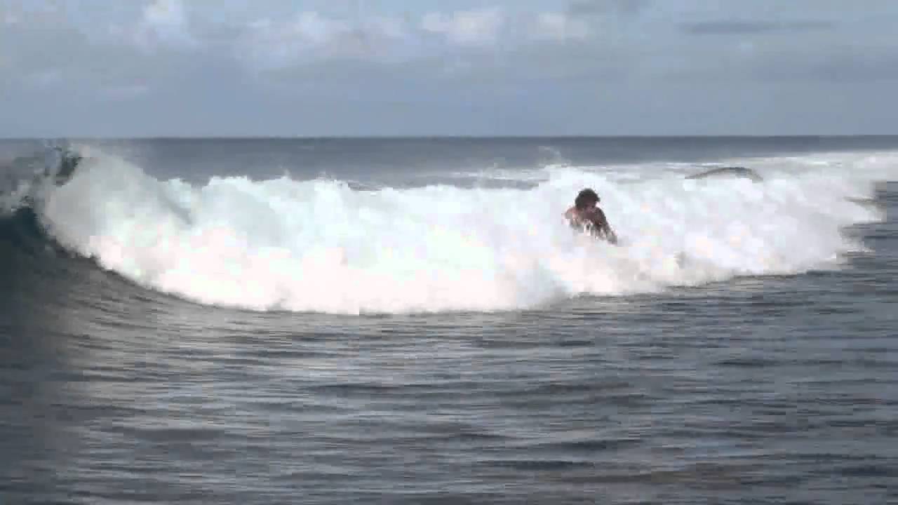 Surfing the Beachouse reef break - YouTube