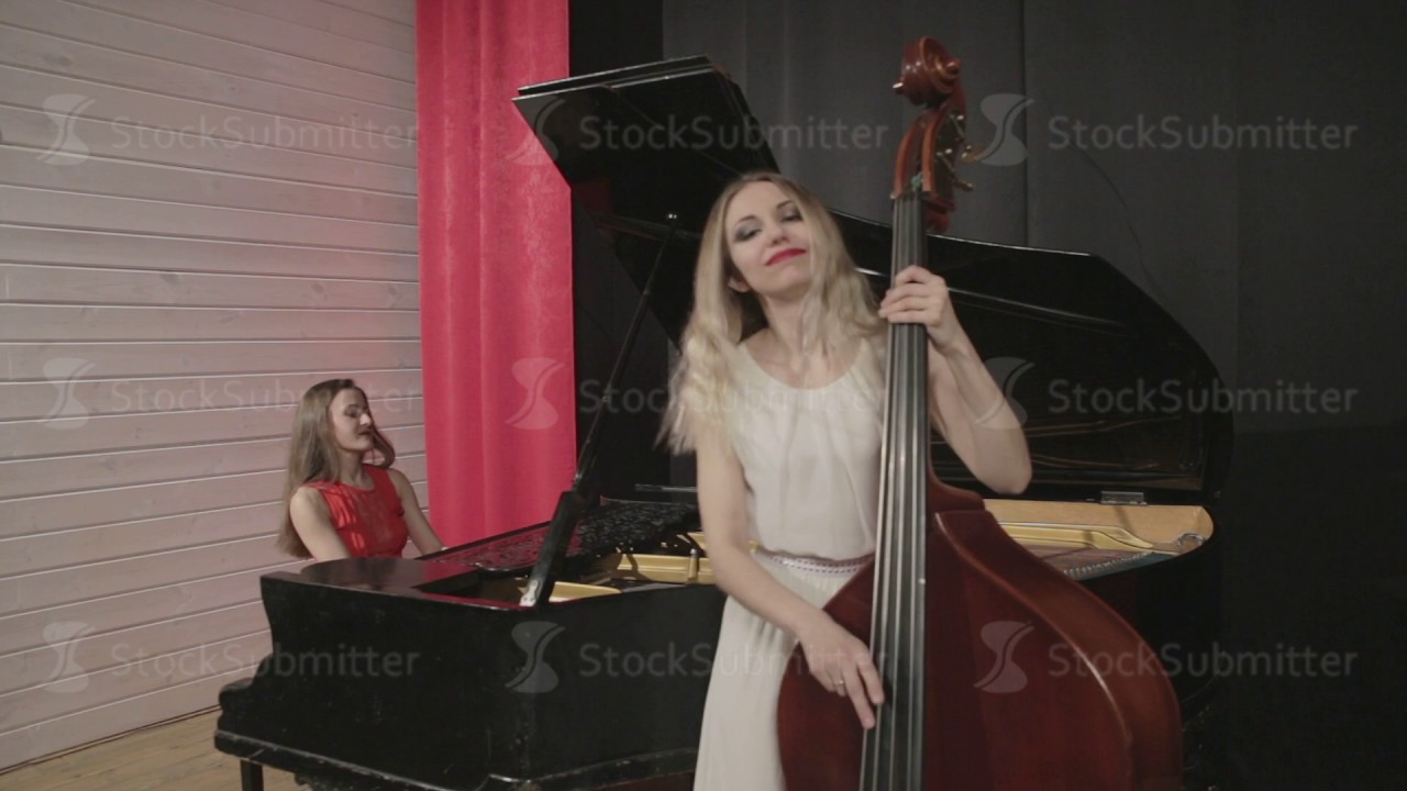 Two girls playing musical instruments. Piano and doublebass - YouTube