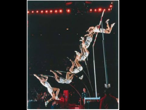 (8-3) A spring with k = 63 N /m hangs vertically next to a ruler. The ...