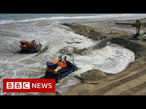 Huge sand dune to protect major UK gas terminal - BBC News