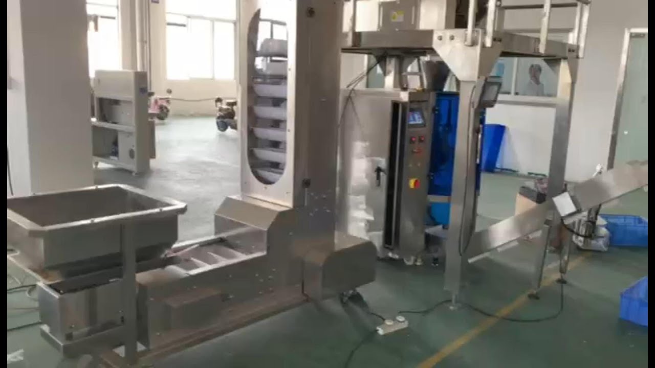 Electronic scale packaging machine - elevator + packaging 1KG beans電子秤包裝機-提昇機+包裝1KG豆子，食品包裝 - YouTube