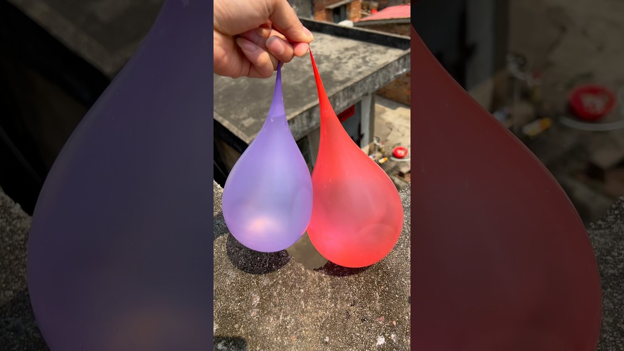 Experiment: Will a water balloon explode if it rolls down from a tall ...