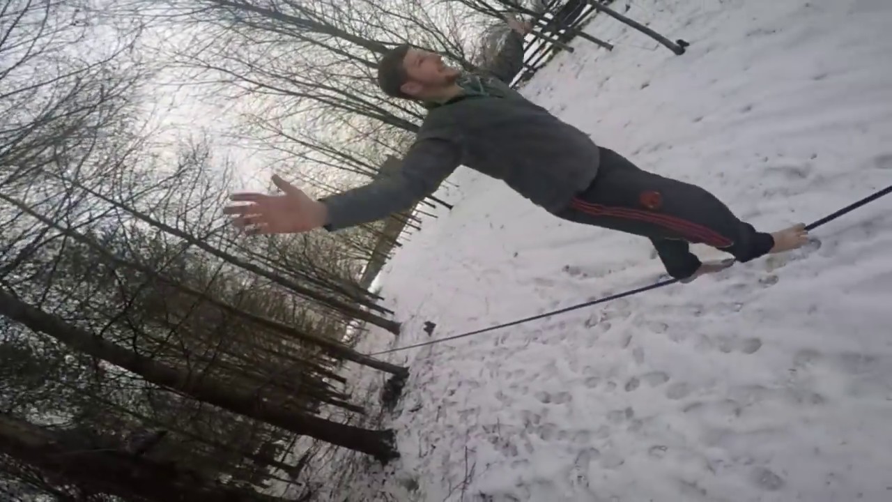 Slacklining above freezing snow below!! - YouTube