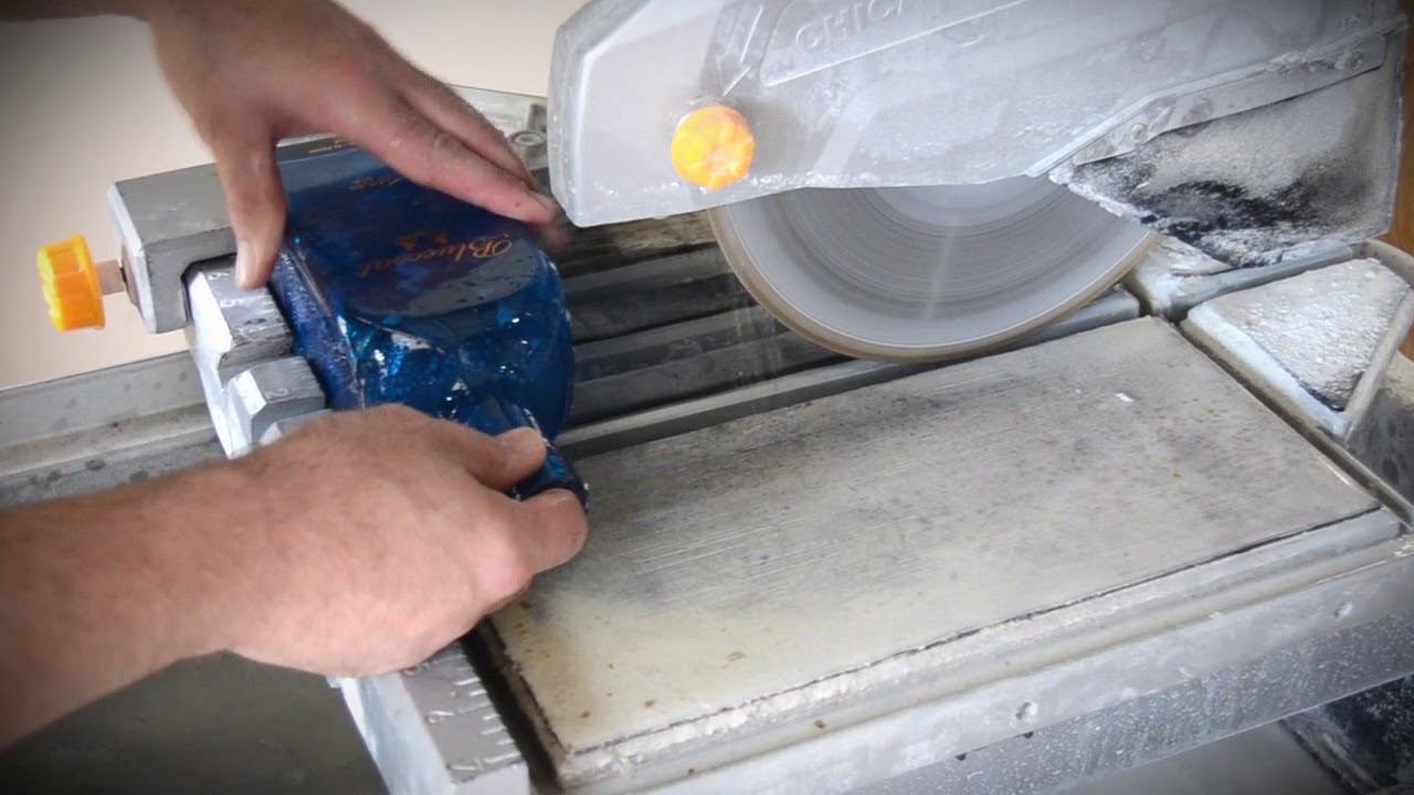 Cutting glass bottles with a tile saw (used for making DIY candles ...