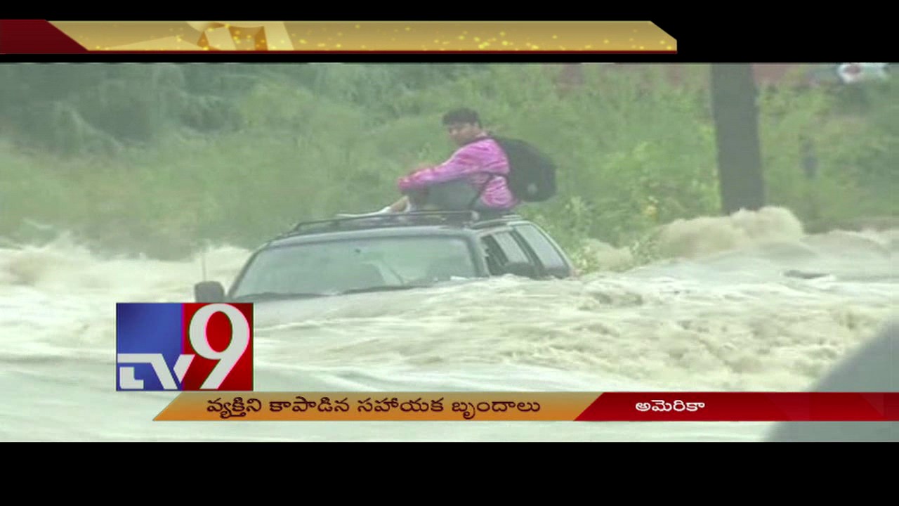 Dramatic high-water rescue : SAFD saves man stranded on SUV - TV9 - YouTube