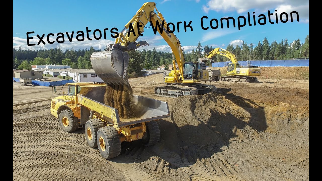 Excavators At Work Loading Trucks and Earth Work Excavation (Komatsu ...