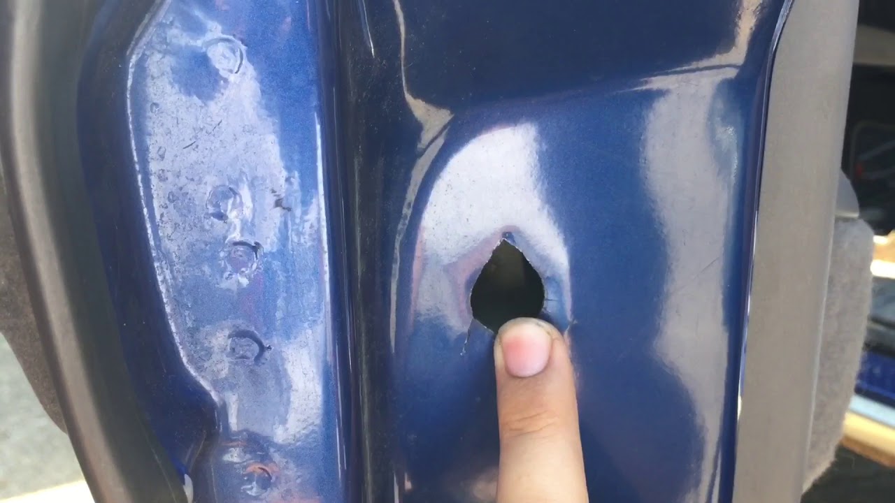 How to fix torn metal around door latch on dodge ram - YouTube