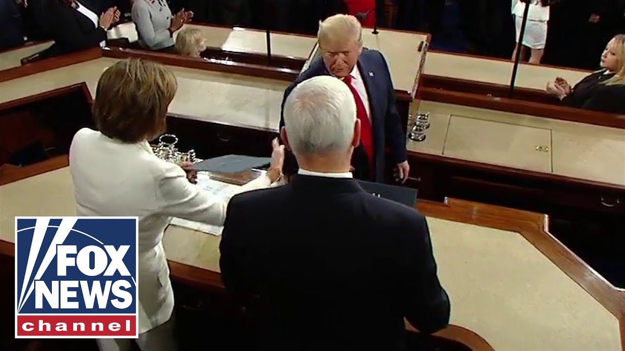 Handshake snub? Trump appears to ignore Pelosi's outstretched hand at ...