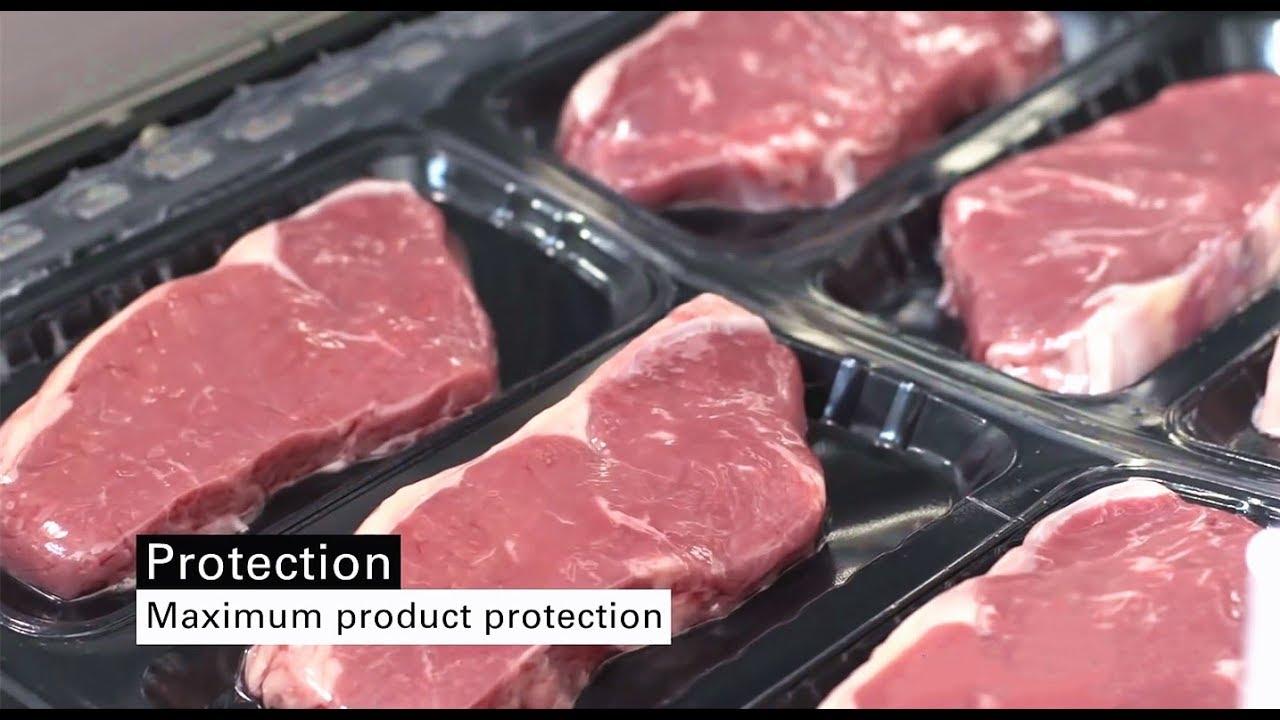 automatic vacuum skin packaging machine for fresh meat - YouTube