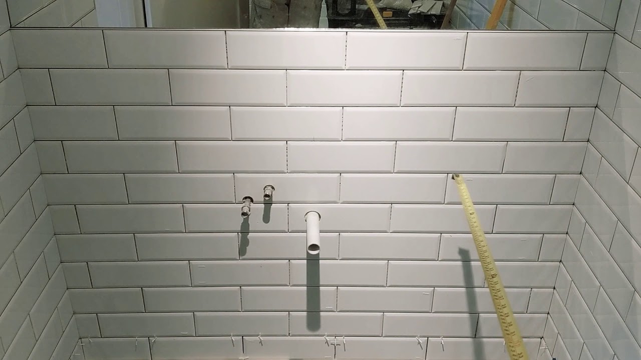 How to set out tiling. metro tiling (half bond) - YouTube