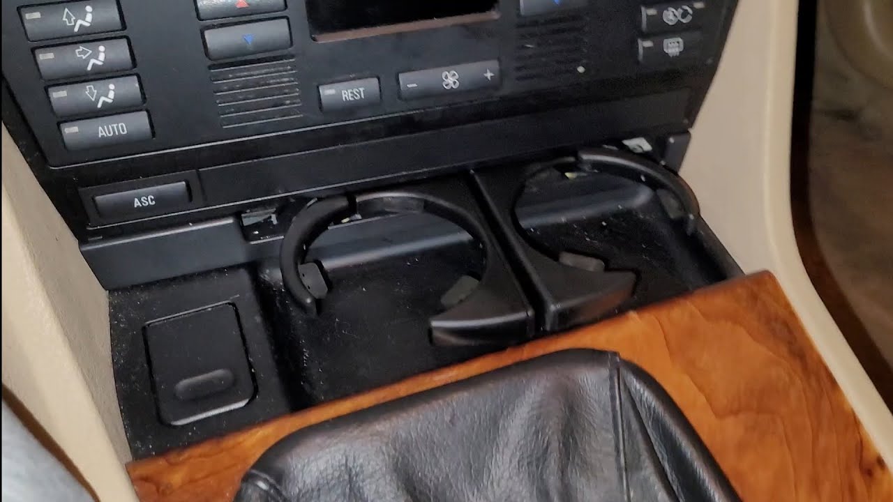 How to Replace ANY BMW e39 front cup holder - YouTube