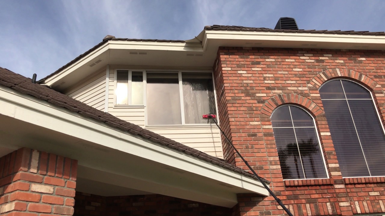 Window Cleaning above a slanted or pitched roof the SAFE way! - YouTube