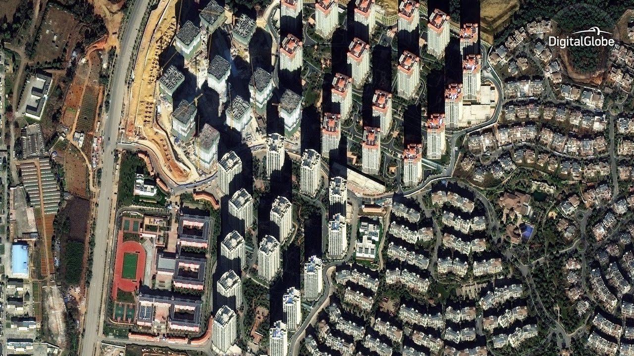 New satellite images show inside China’s ghost cities - YouTube