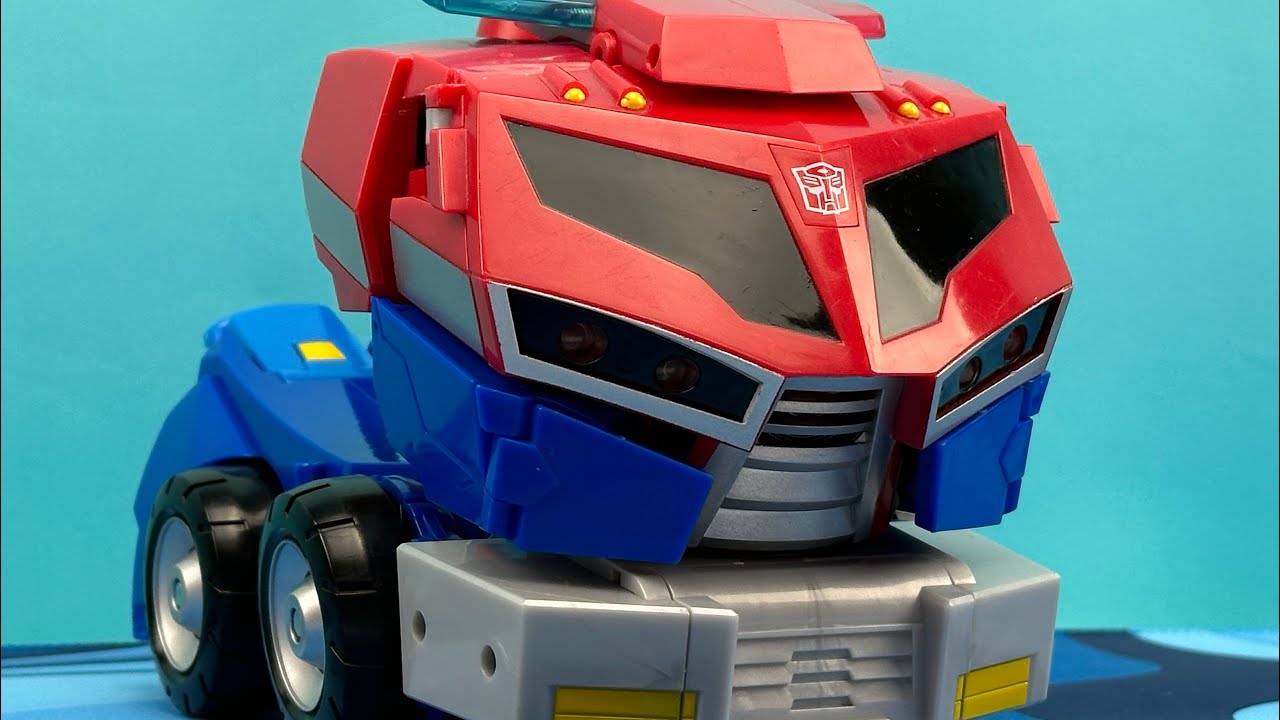 OPTIMUS PRIME TRANSFORMERS ANIMATED COMMAND AND ROLL OUT SUPREME CLASS ...