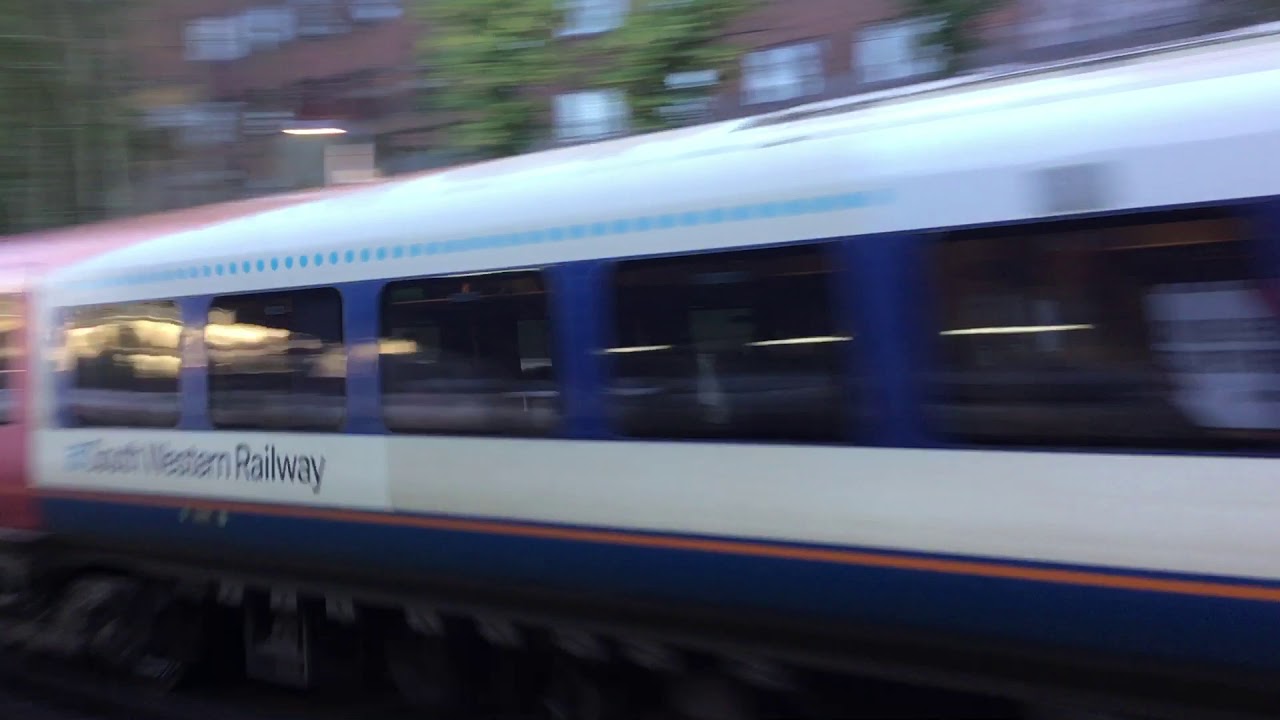 SWR class 450 flies through Putney - YouTube