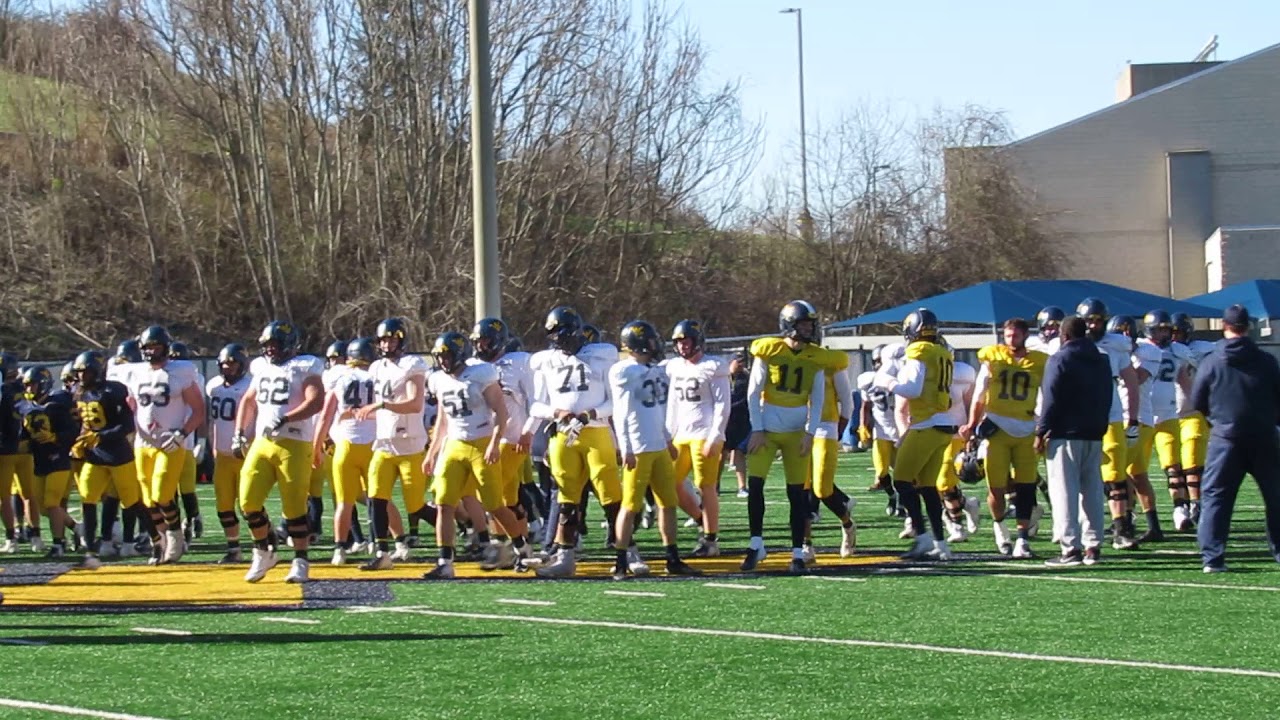 WVU Football Spring Practice 3/26: Team Stretches and Warmups - YouTube