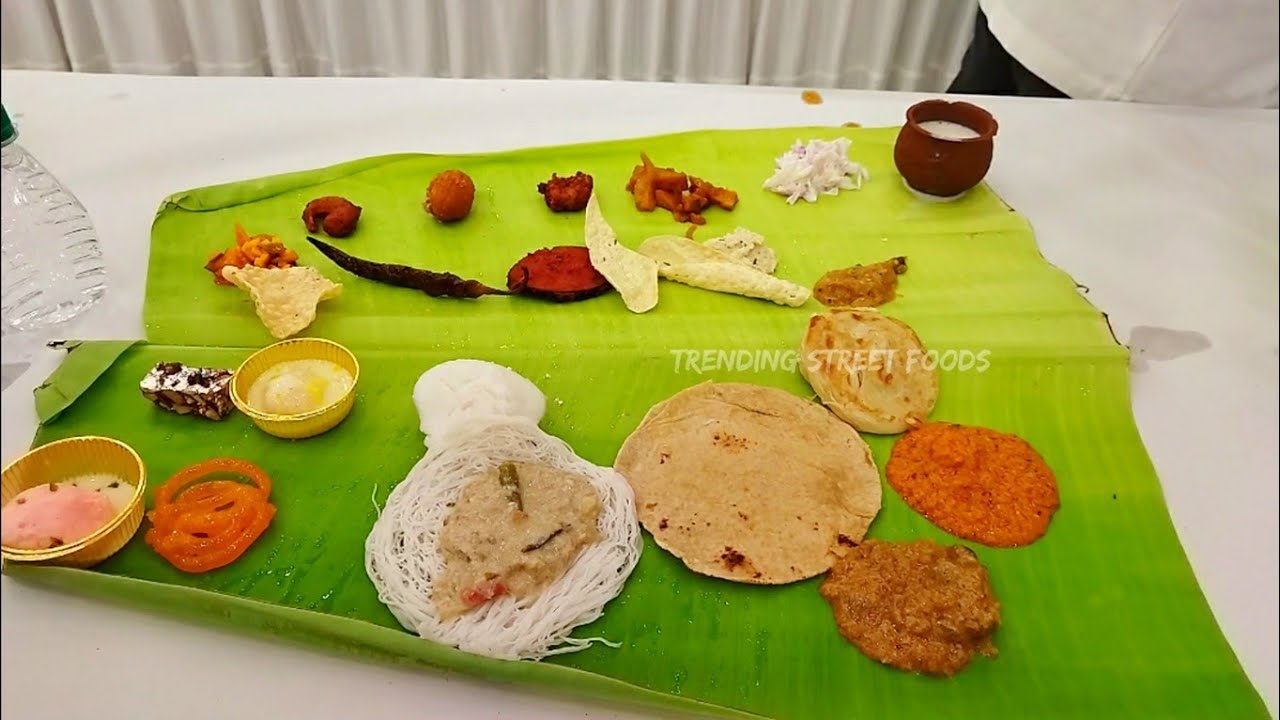 Grand Tamil Wedding Dinner Served in a Banana Leaf - YouTube