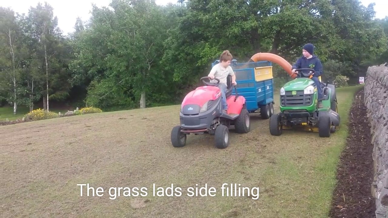 The grass lads lift grass and move trees With the Kane low loader - YouTube
