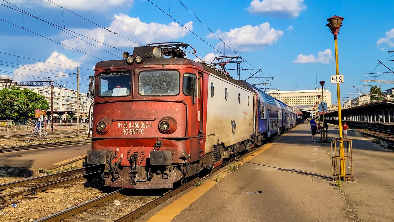 Locomotiva EA 397 părăsind "Gara de Nord" la tracțiunea trenului RE5009 (București Nord-Ploiești ...