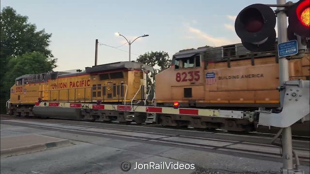 4/11/25 Pre: WB UP stack train led by small flag scheme UP 5752 passes by Mission Mill Rd - YouTube