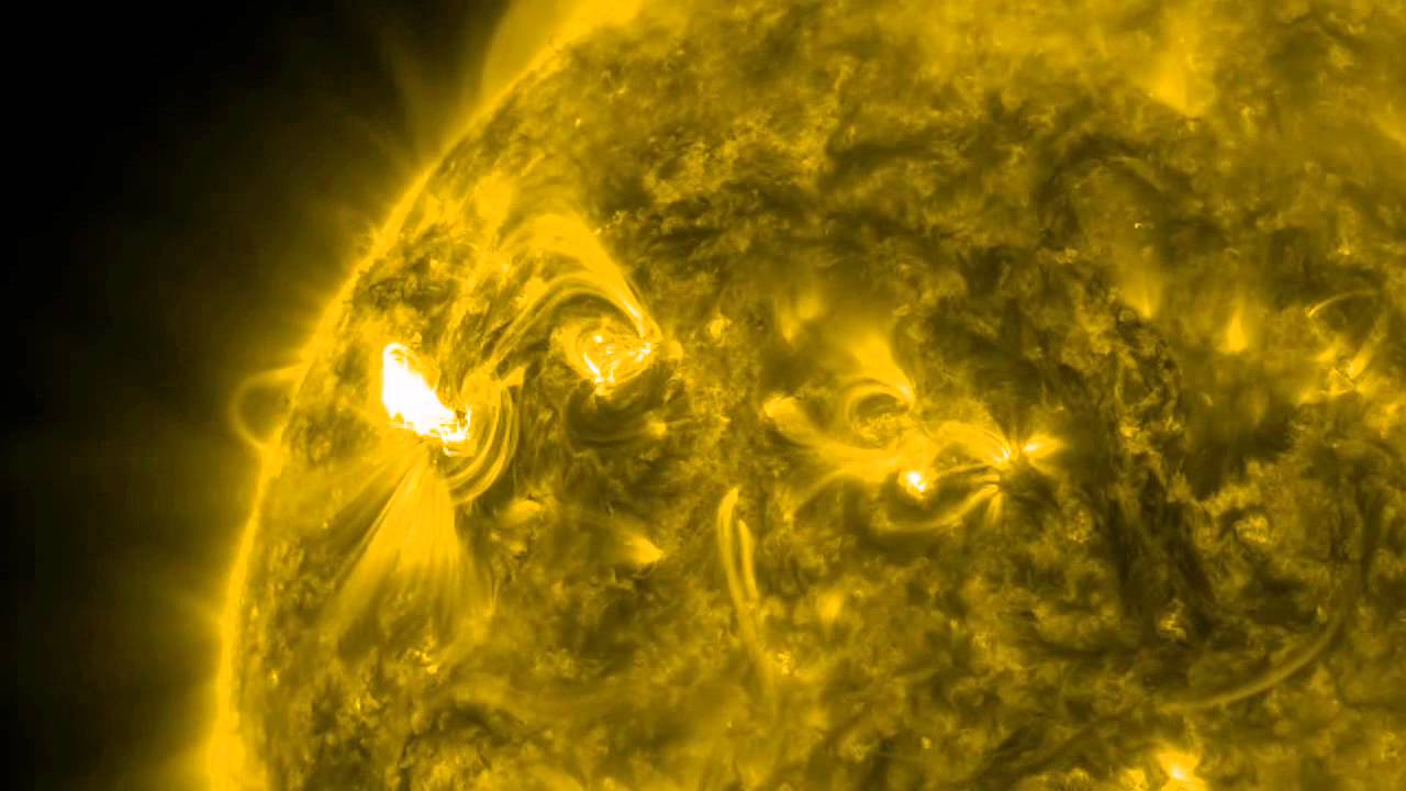NASA | Active Region on the Sun Spits Out Three Flares - YouTube