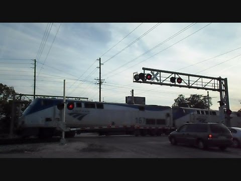 Amtrak Train Goes Through A Four Gate Crossing - YouTube