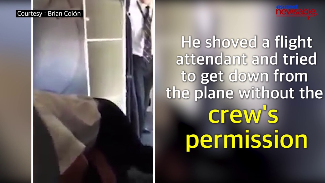 Airline pilot tackles drunk, misbehaving passenger - YouTube