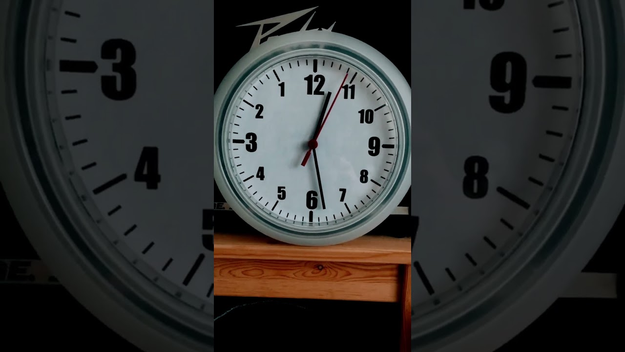 Reverse wall clock - YouTube