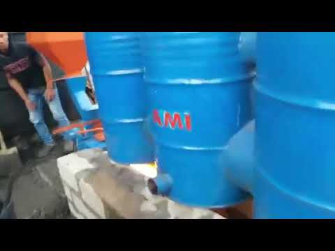 Penguaian aspal beku, dg woodpellet - YouTube