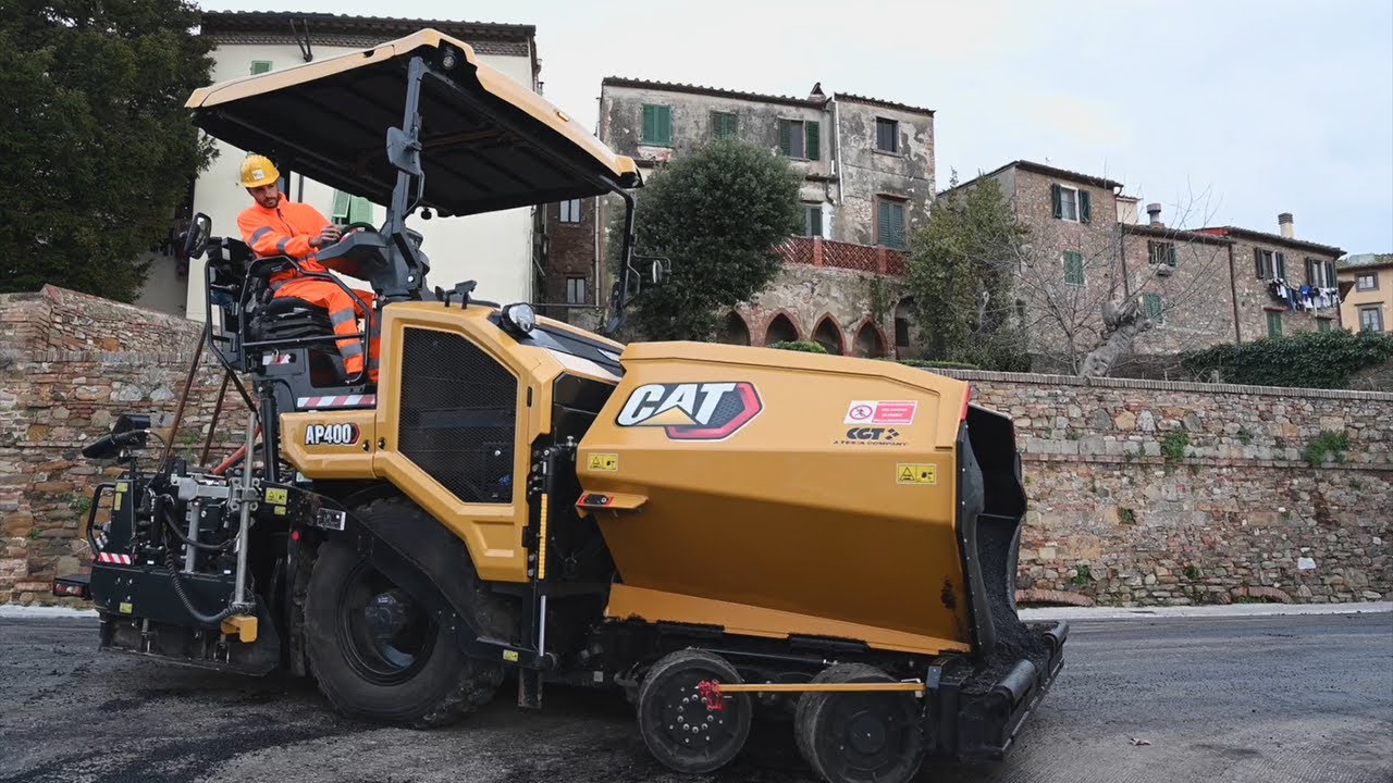 Cat® mid-sized asphalt pavers on show in Montaoine - YouTube