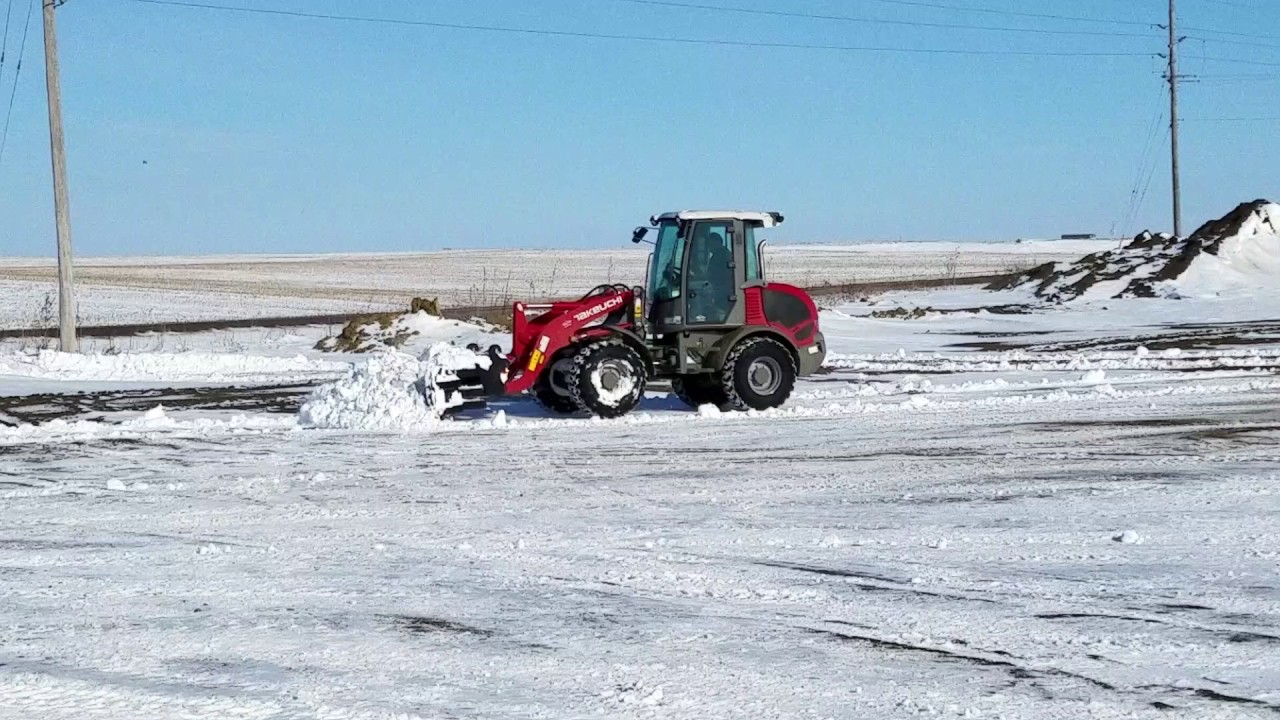 New Tec, Inc. Snow Pusher on Takeuchi TW80 - YouTube