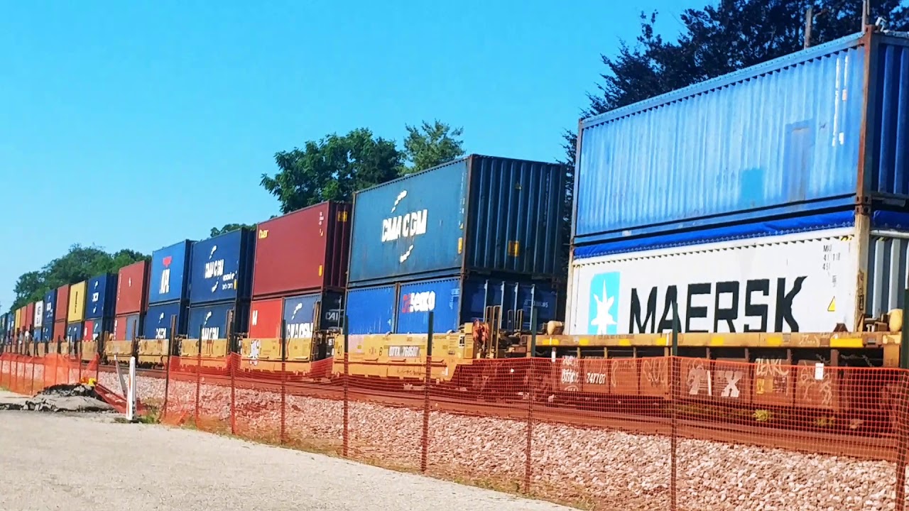 Northbound CSX Q 202 with autoracks leading and containers trailing ...