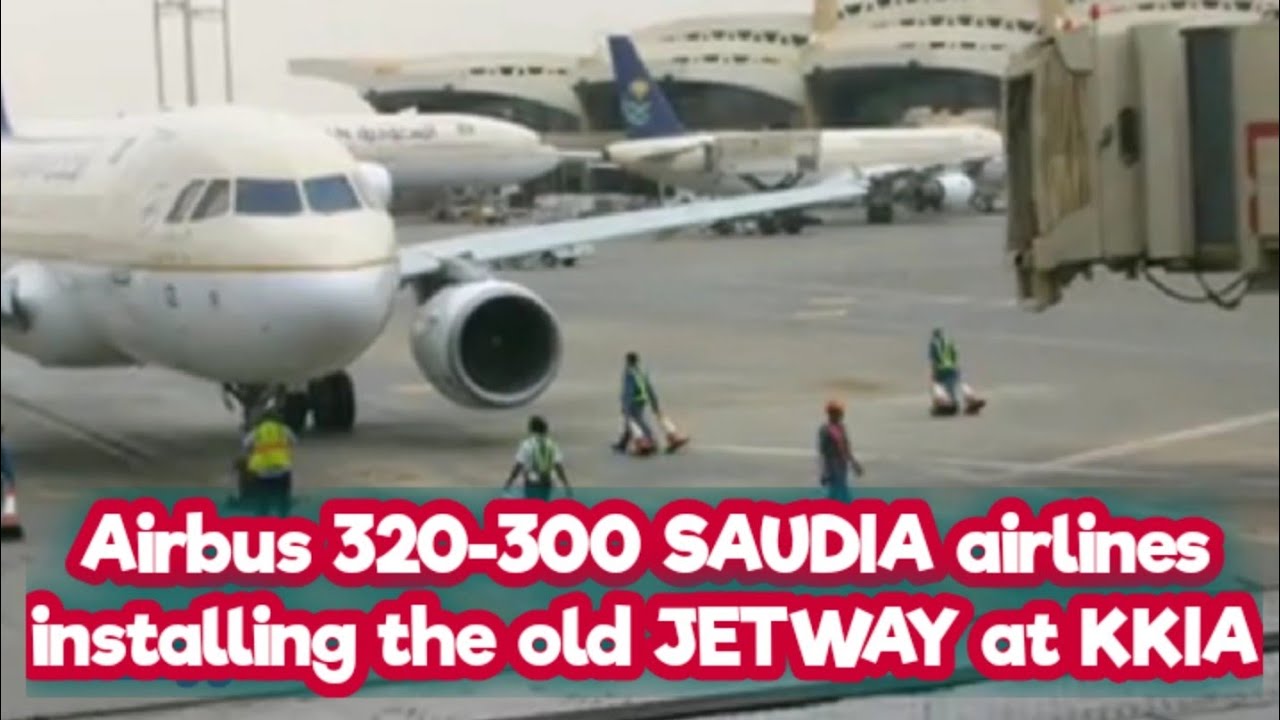 Airbus 320-300 SAUDIA AIRLINES installing the old JETWAY at KKIA riyadh ...