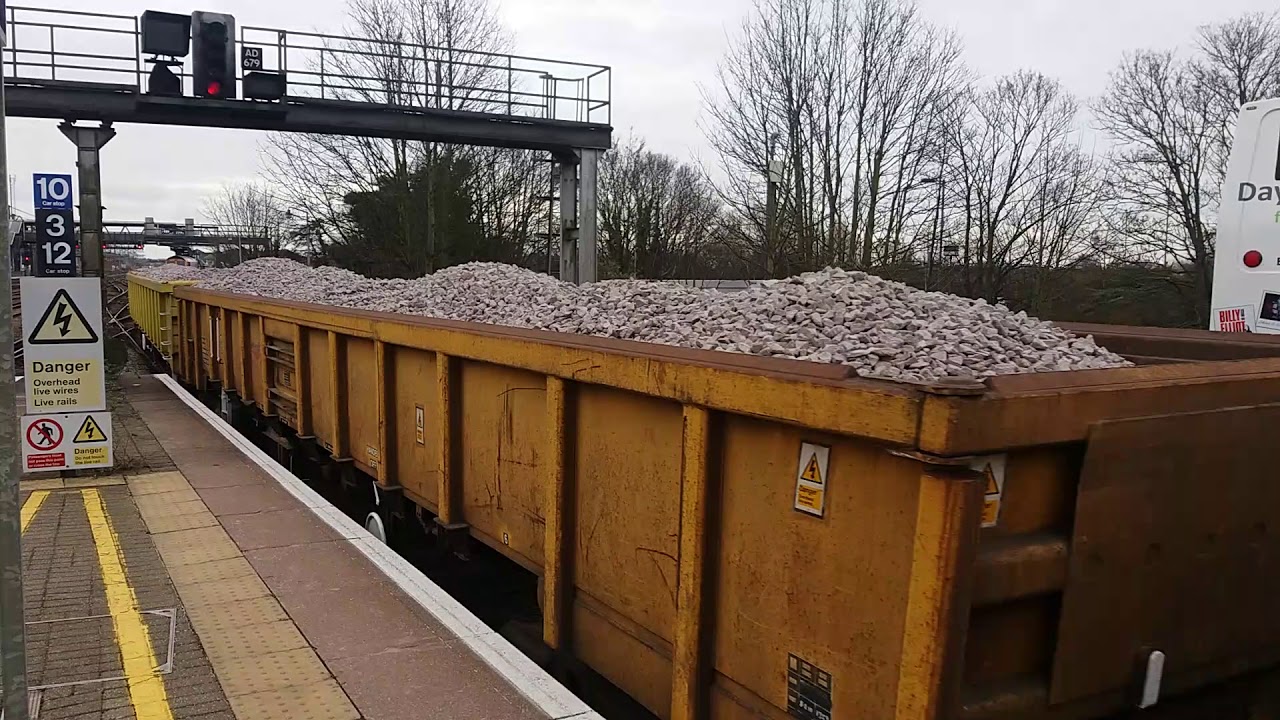 CLASS 66766 GBRF BALAST TRAIN GOING THROUGH ASHFORD - YouTube