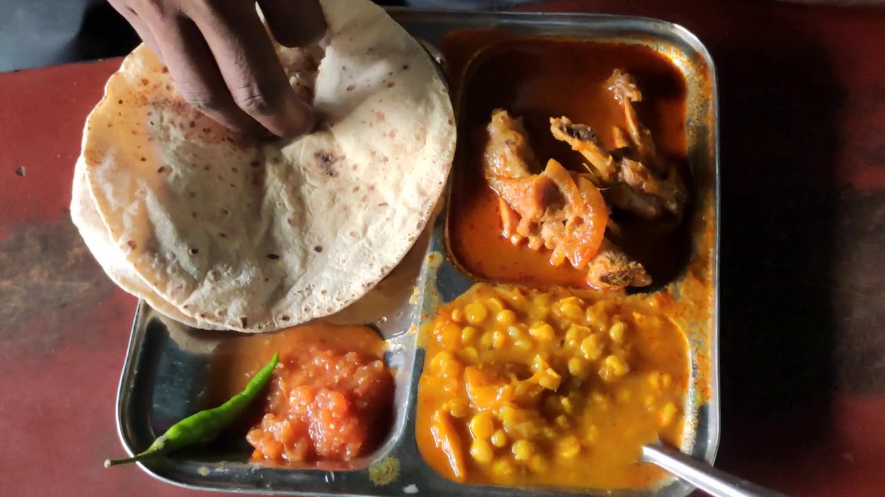 Eating amazing roti made in chulha with chicken, gugni and tomato ...