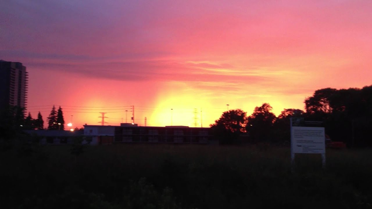 strange colours in the sky at sunset - YouTube