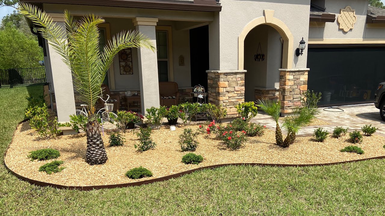 Installing Brown river rock & @Colmet landscape edging in NORTH FLORIDA ...