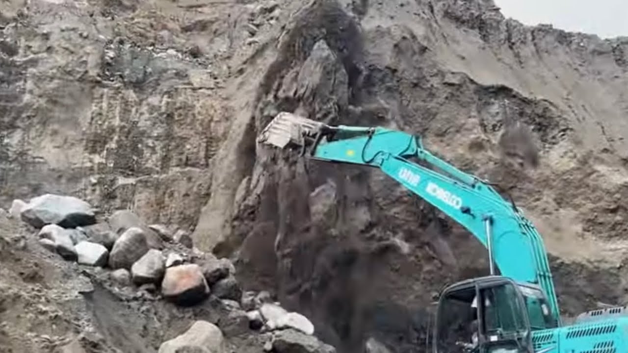 sand mining|| Excavators work to dredge sand, which causes cliffs to ...
