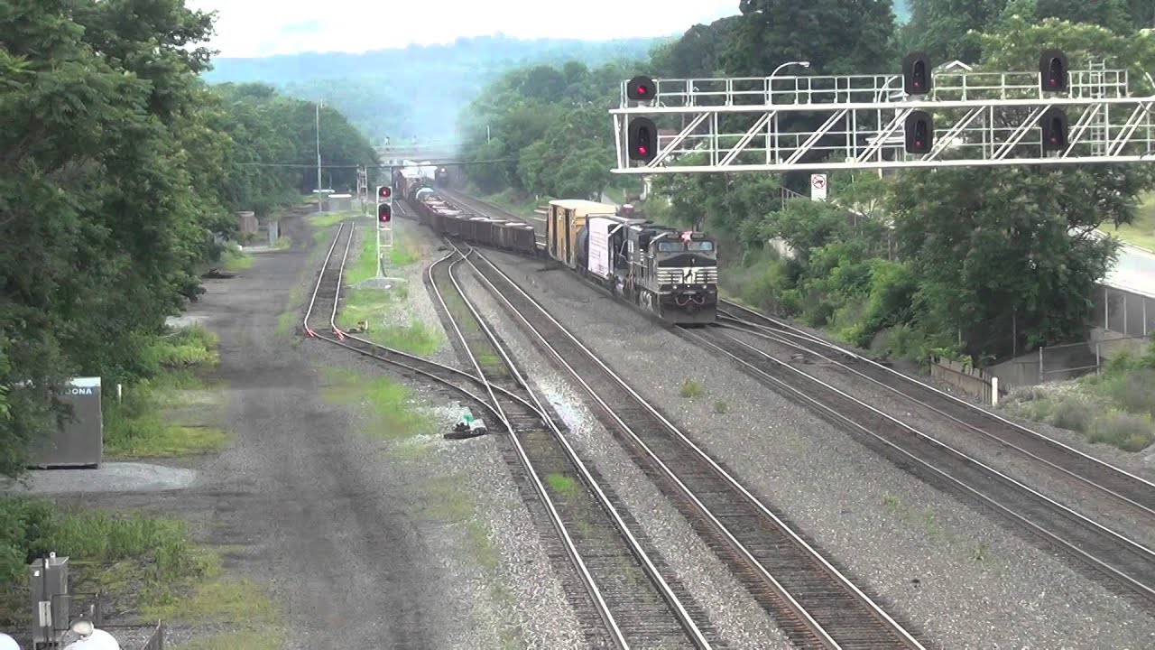 NS C44-9W #9343 & SD40E #6348 with manifest train come off Horseshoe ...