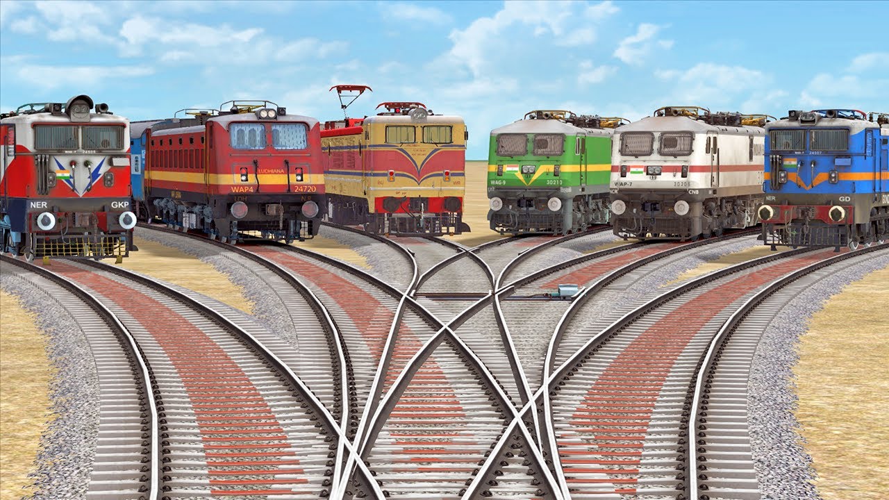 SIX TRAINS AT SIX LINE FORKED BRANCHED DIAMOND RAILROAD CROSSING ...