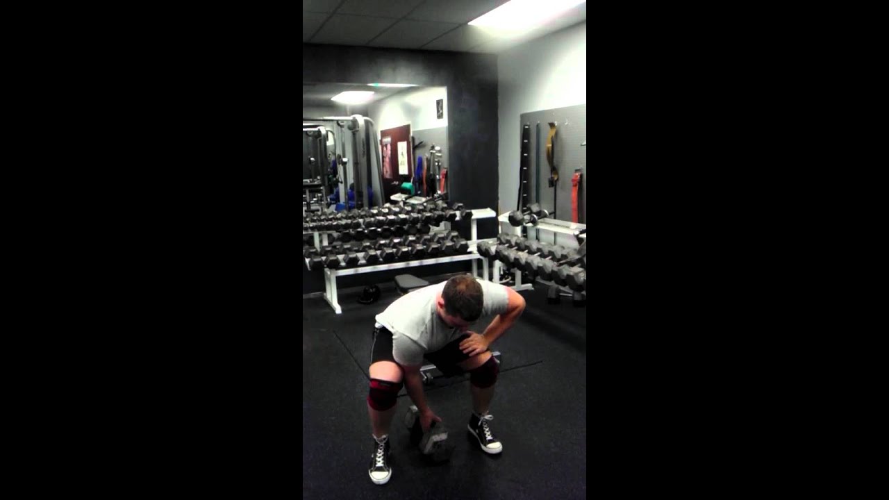 One arm dumbbell swing 75lb - YouTube
