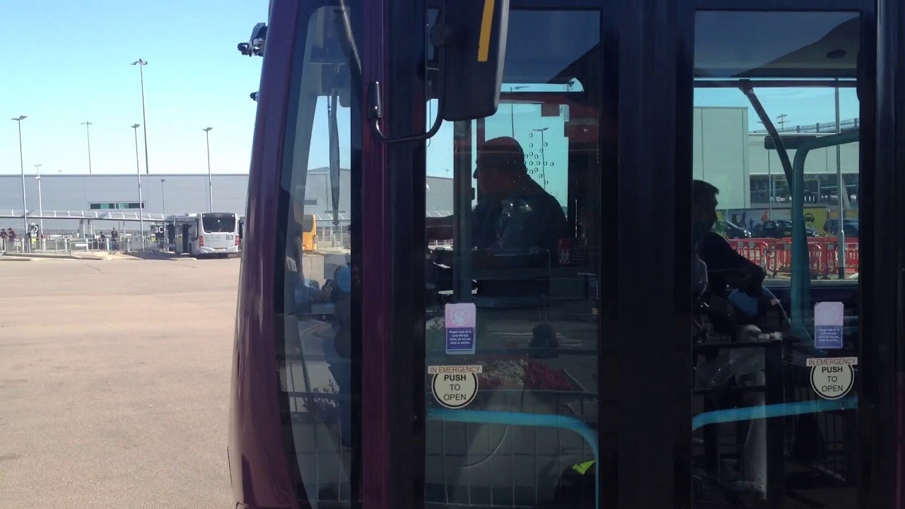 Here is a purple bendy bus in Luton Airport - YouTube