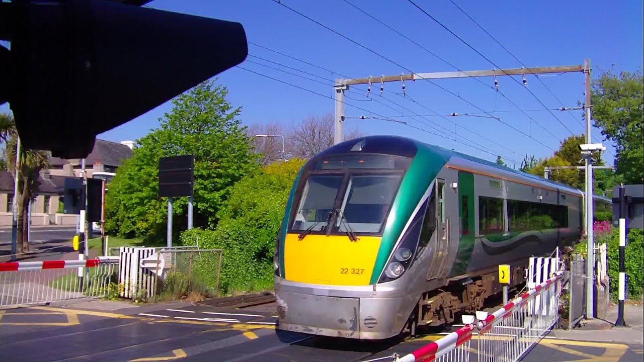 Level Crossing at Merrion Gates - Two 22000 class Intercity Trains ...