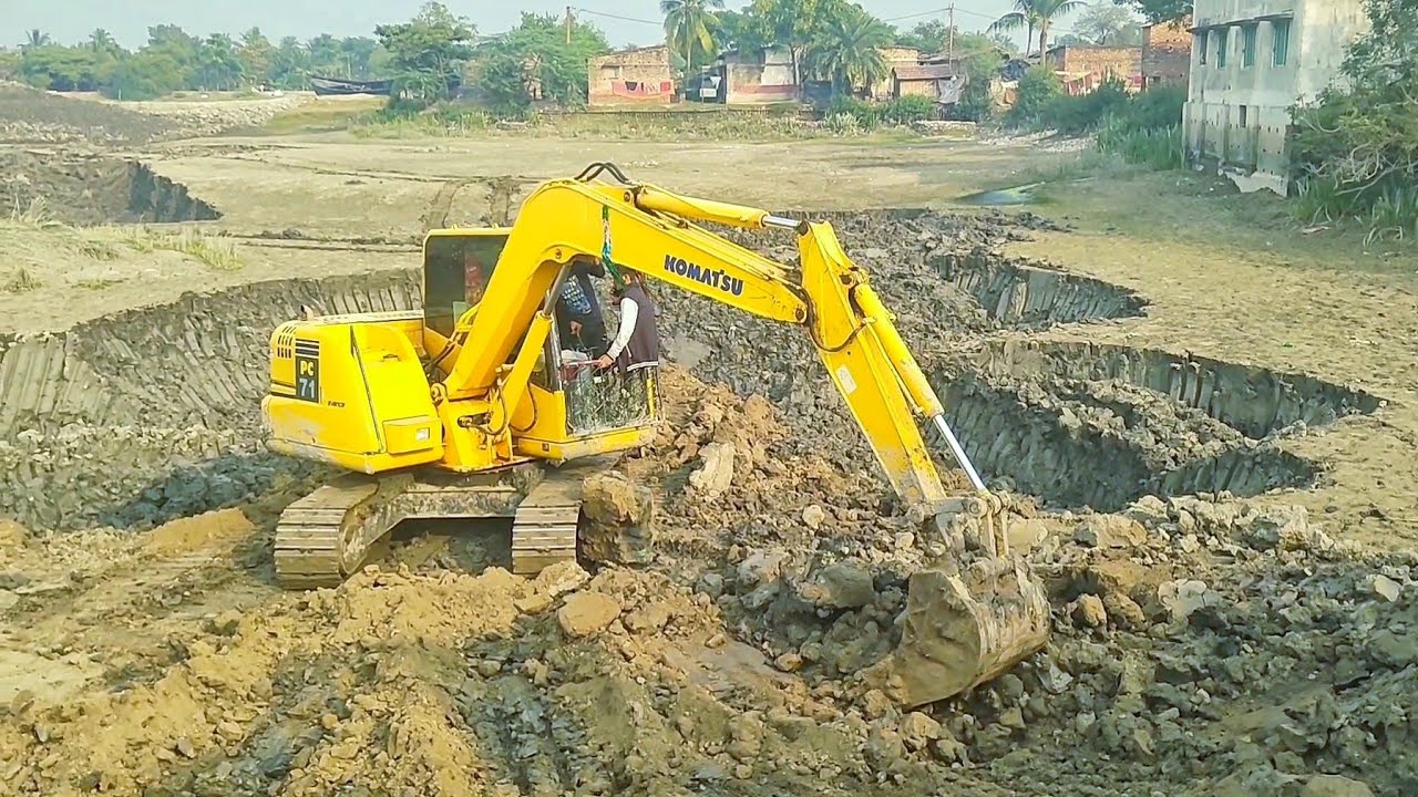 Komatsu PC71 Excavator working on the soil shifting - YouTube