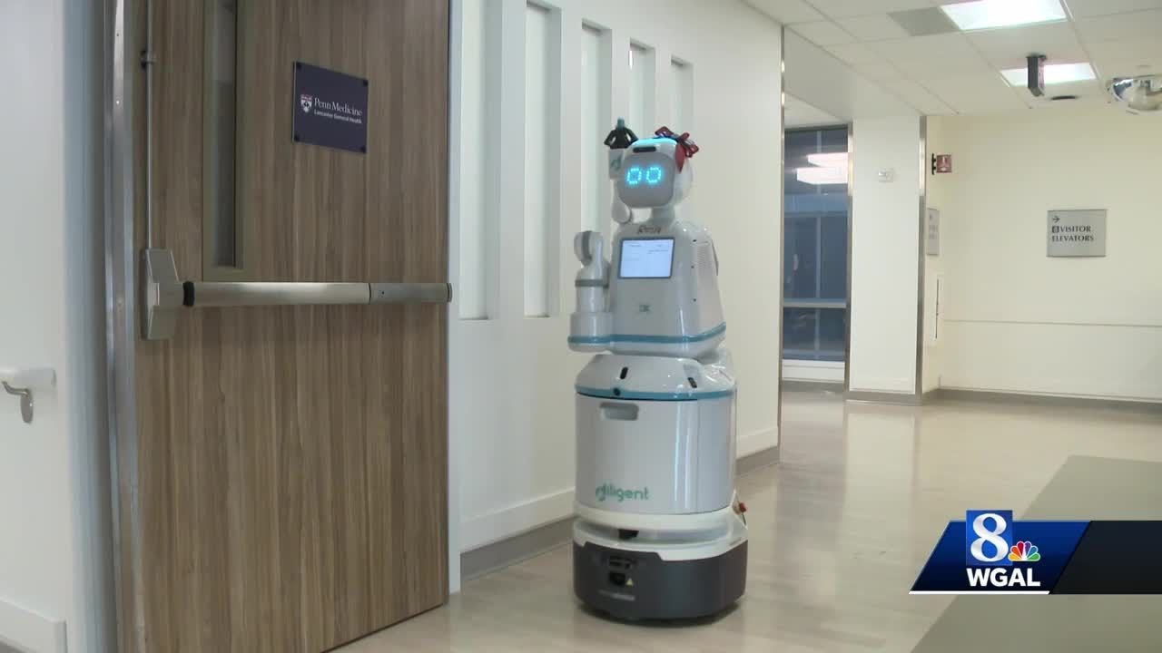 Hospital adds robots to nursing team - YouTube