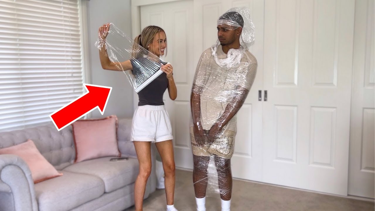 100 Layers Of Saran Wrap Challenge! Did She Cheat? - YouTube